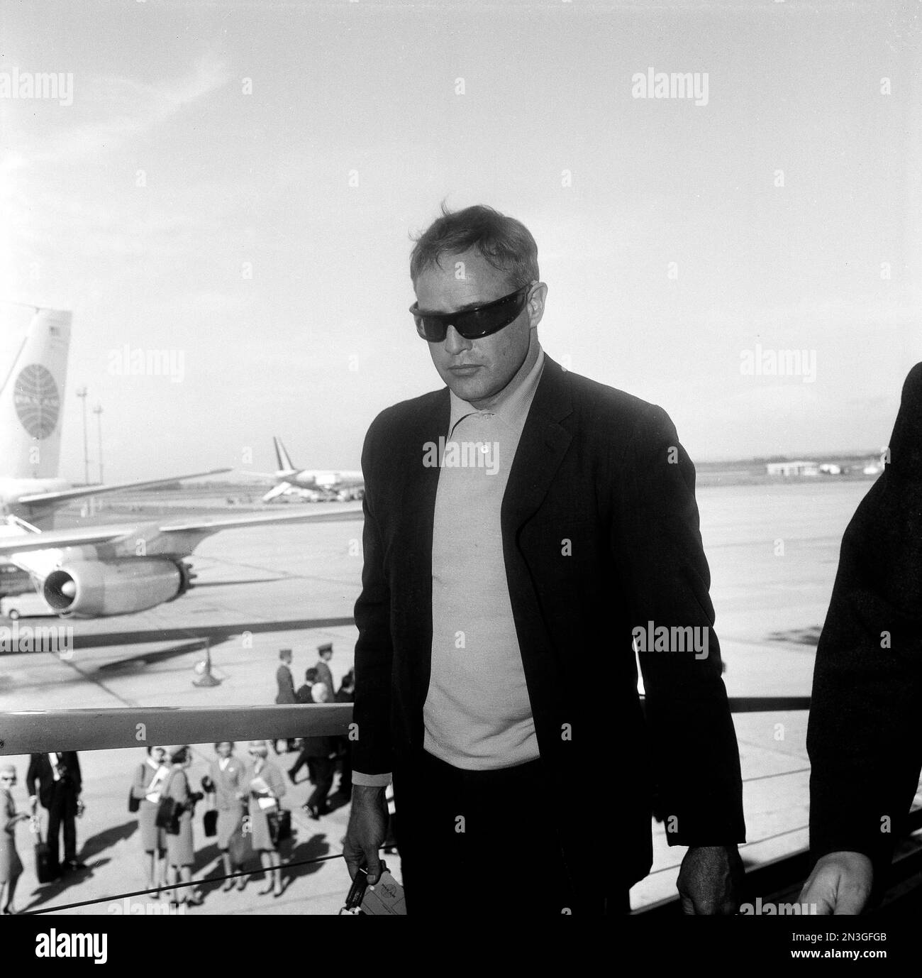 American actor Marlon Brando arrives at Rome's Fiumicino Airport from ...