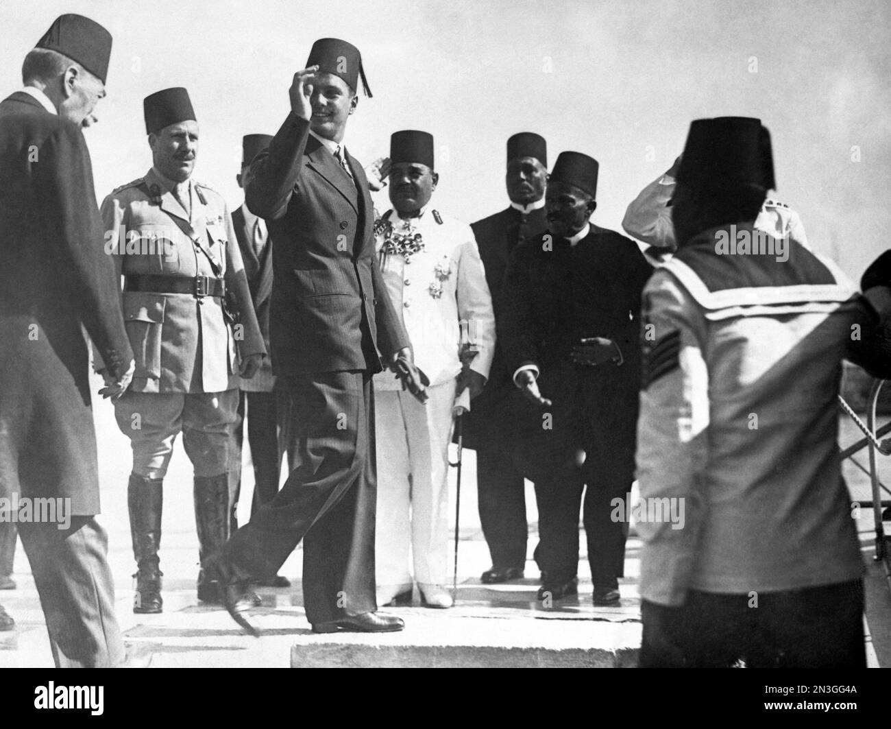 Prince Farouk, heir to the Egyptian throne, waving a farewell to ...