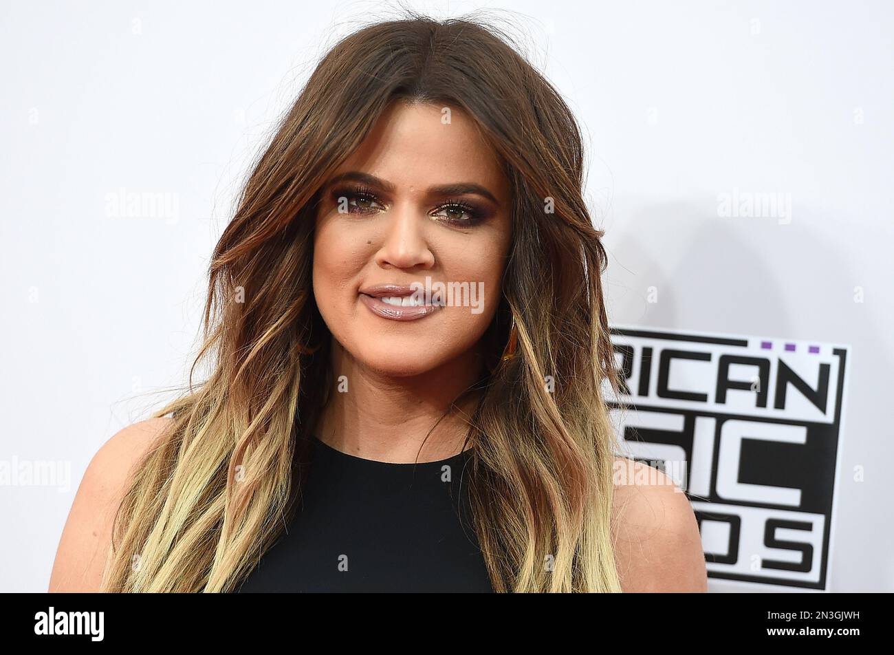 Khloe Kardashian arrives at the 42nd annual American Music Awards at ...