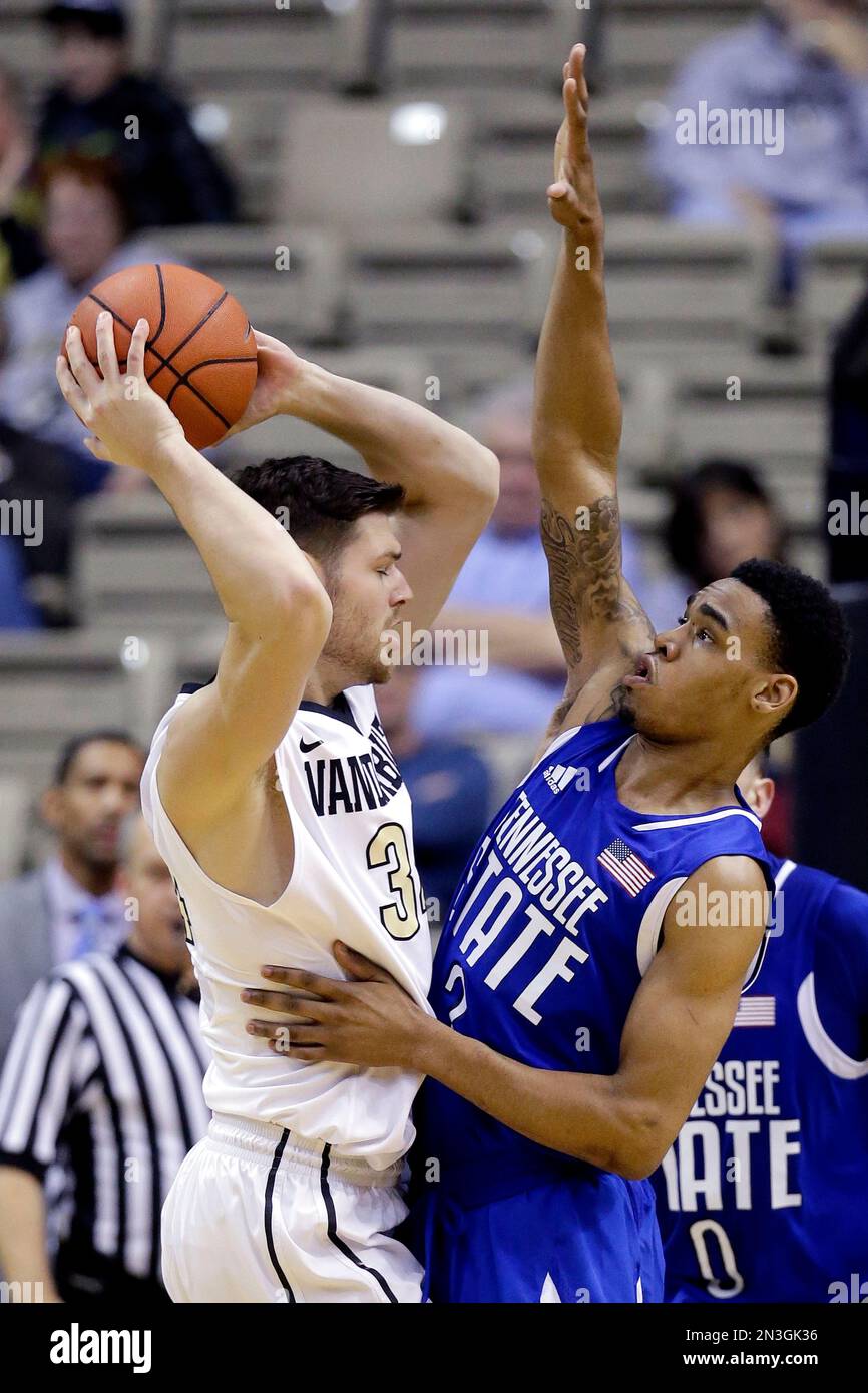 Tennessee State guard Marcus Roper, right, defends against Vanderbilt ...