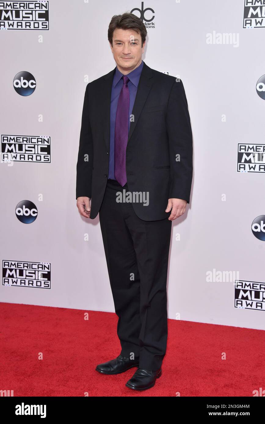 Nathan Fillion arrives at the 42nd annual American Music Awards at ...