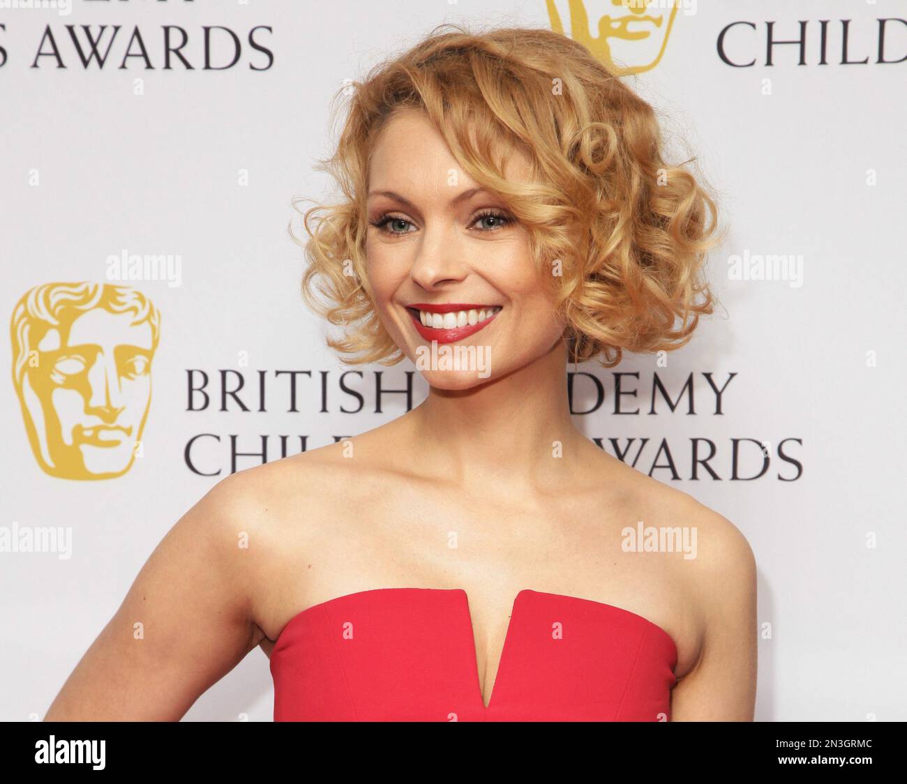 Actress MyAnna Buring poses for photographers as she arrives for the British Academy Children's ...
