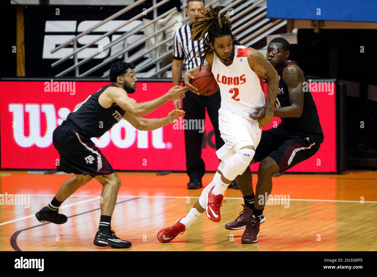 Texas A&M guard Alex Robinson, left, and teammate guard Jalen Jones ...