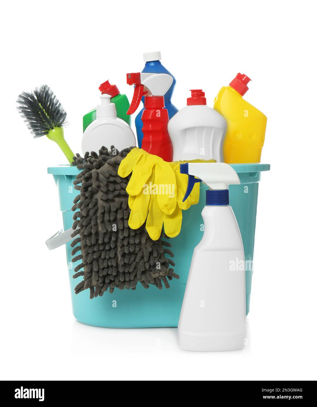 Bucket with different cleaning products and tools on white background ...