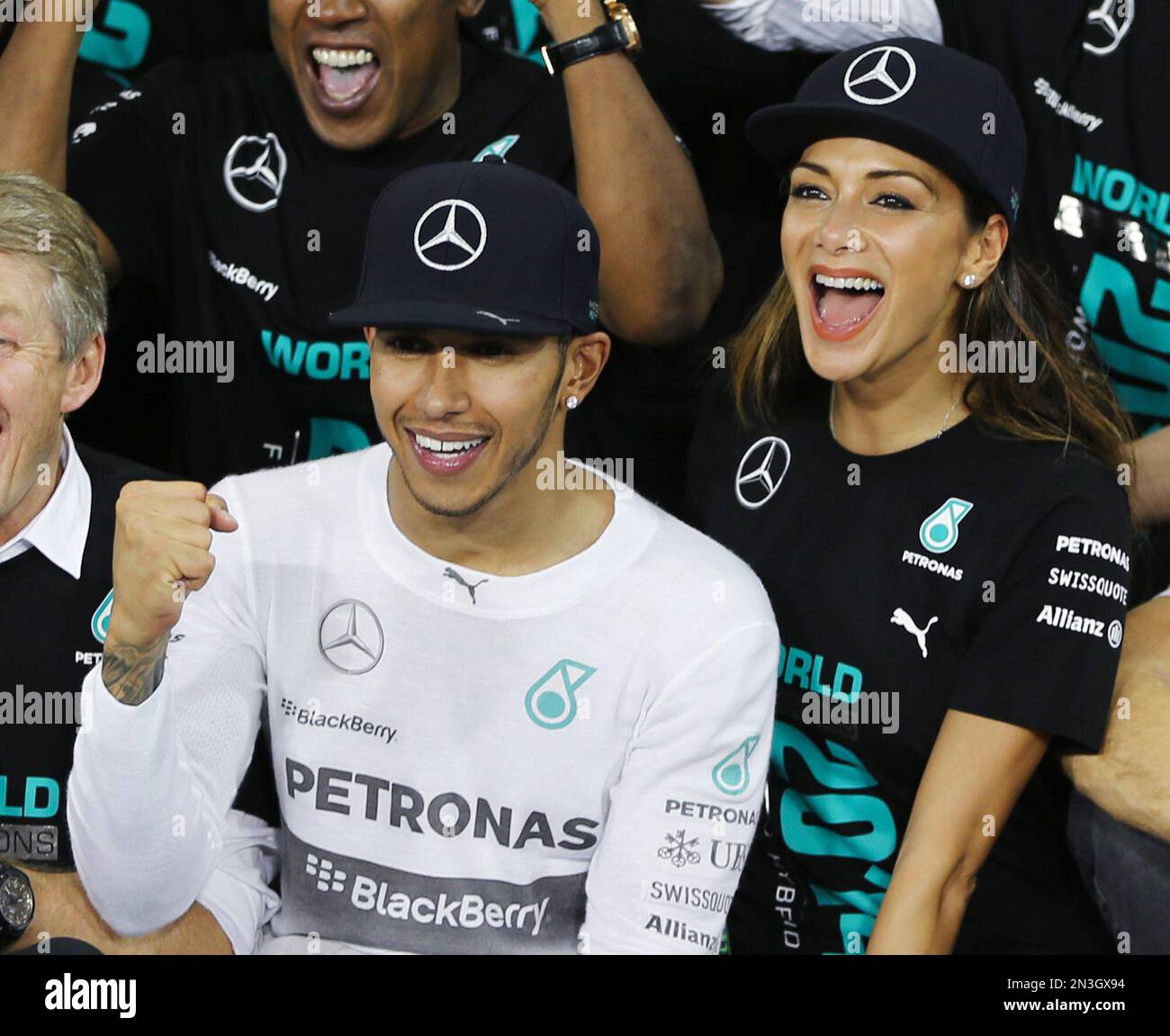 Mercedes driver Lewis Hamilton of Britain celebrates with his partner ...