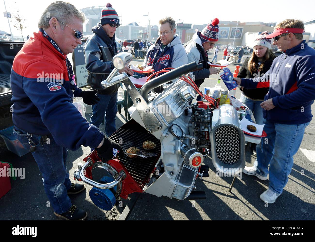 New England Patriots fan Billy Burrows, left, from Billerica, Mass ...