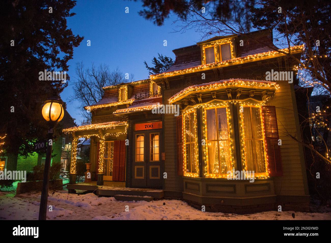 Christmas lights adorn the historic Lewis-Syford House, built in 1878 ...