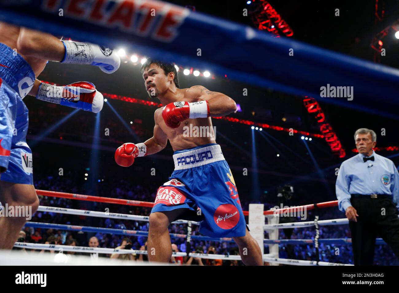 WBO welterweight champion Manny Pacquiao of the Philippines, right, fights WBO junior ...