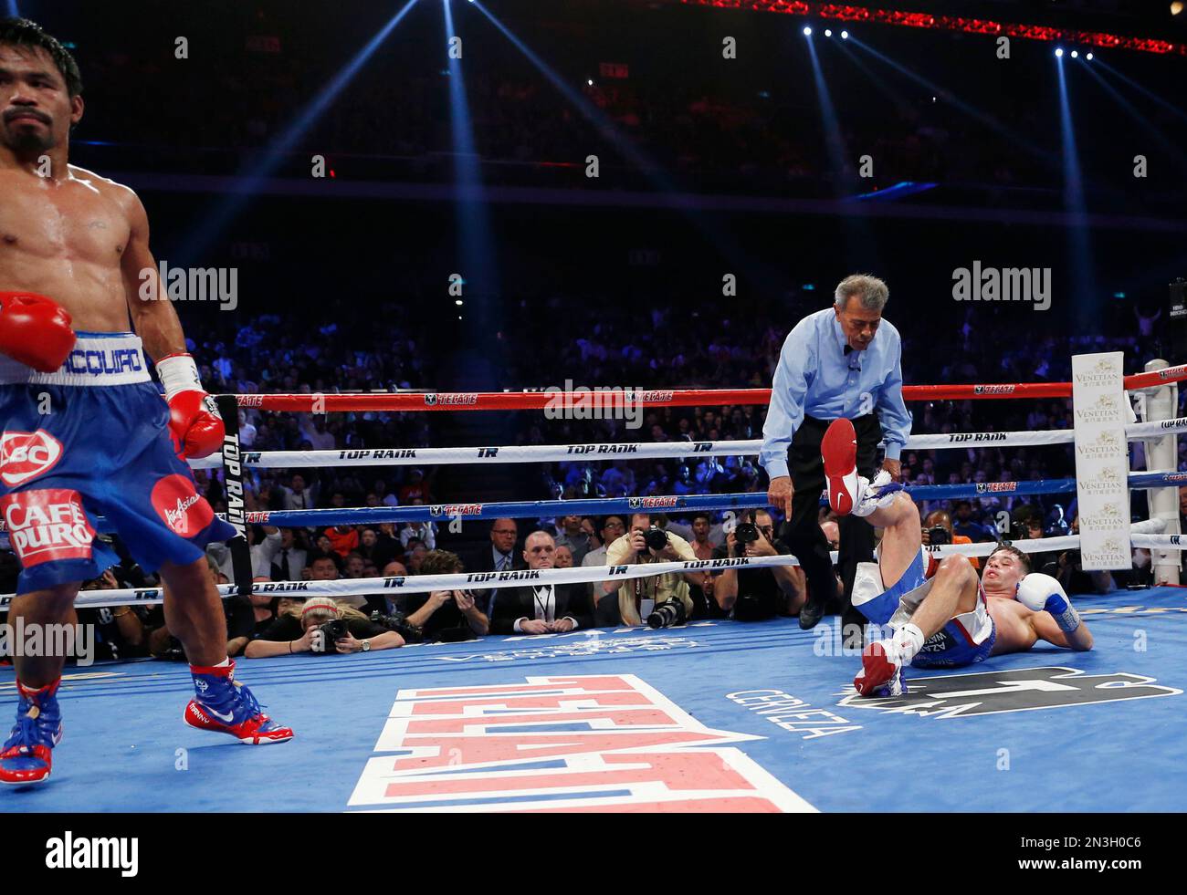 WBO junior welterweight champion Chris Algieri of the U.S. right, falls ...