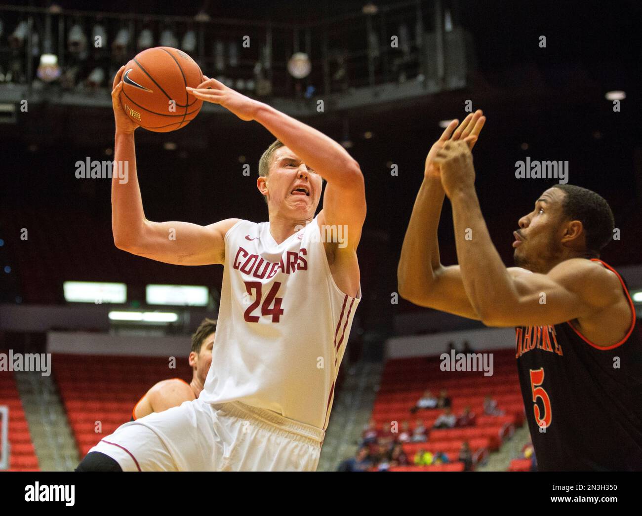 Washington State forward Josh Hawkinson (24) shoots over Idaho State ...