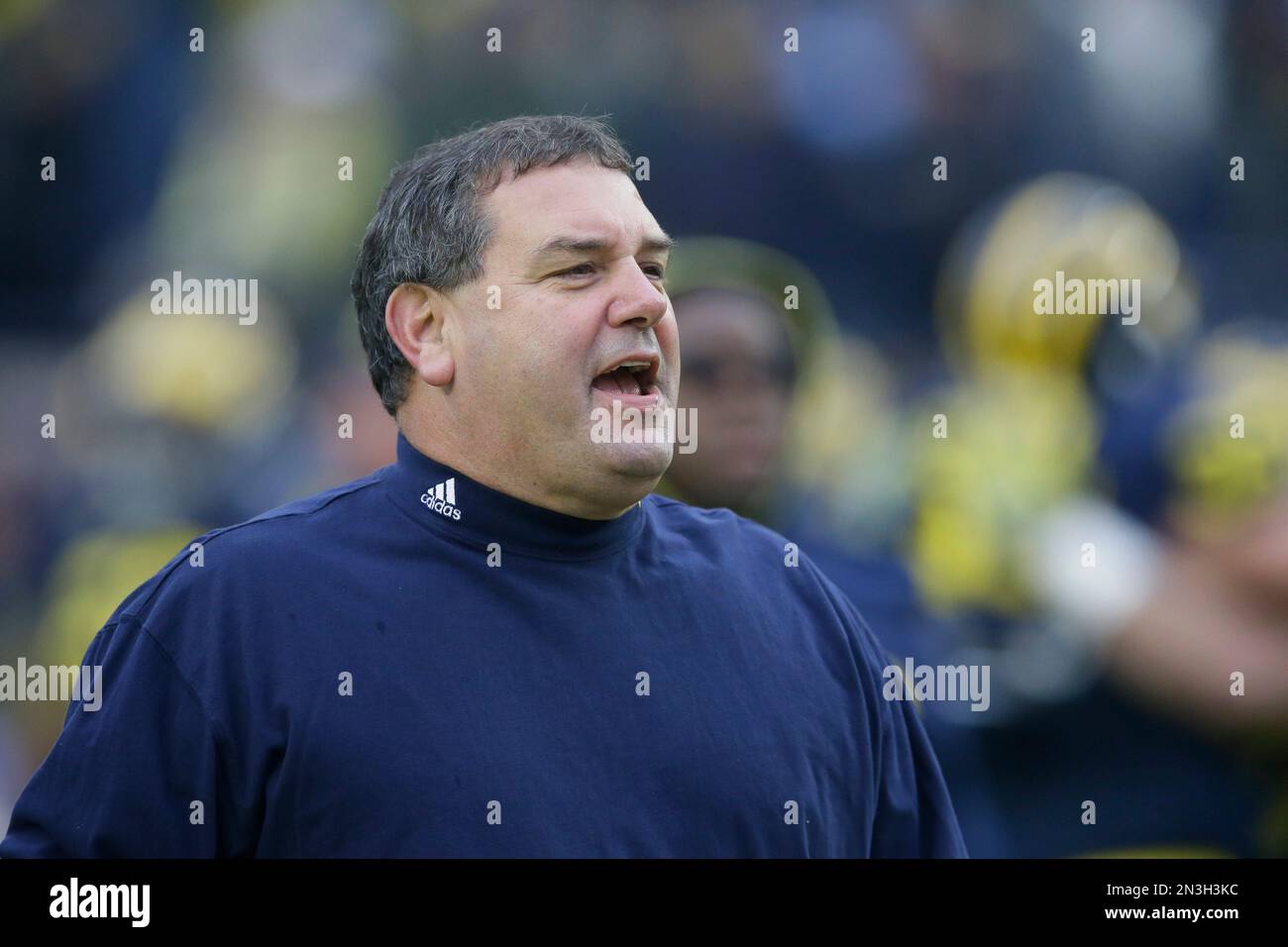Michigan head coach Brady Hoke is seen during warmups before the NCAA ...