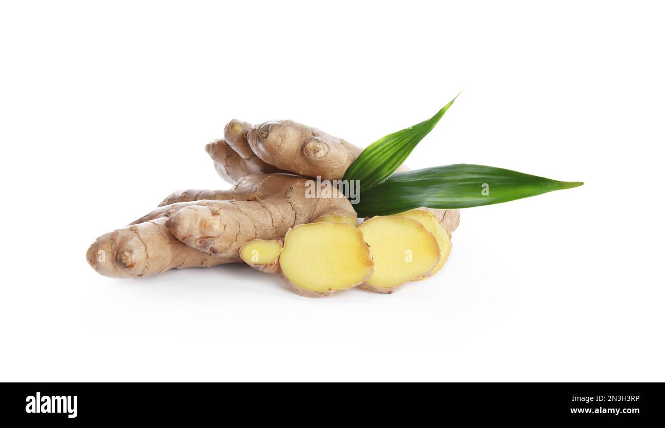 Whole and cut fresh ginger with leaves isolated on white background ...