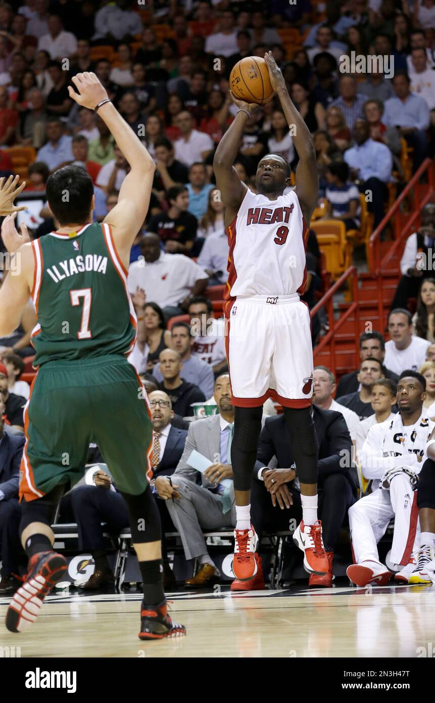 Miami Heat forward Luol Deng (9) of Sudan, takes a three-point shot ...