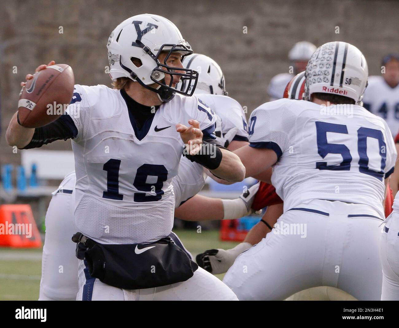 Yale quarterback Morgan Roberts (19) looks to throw a pass during the ...