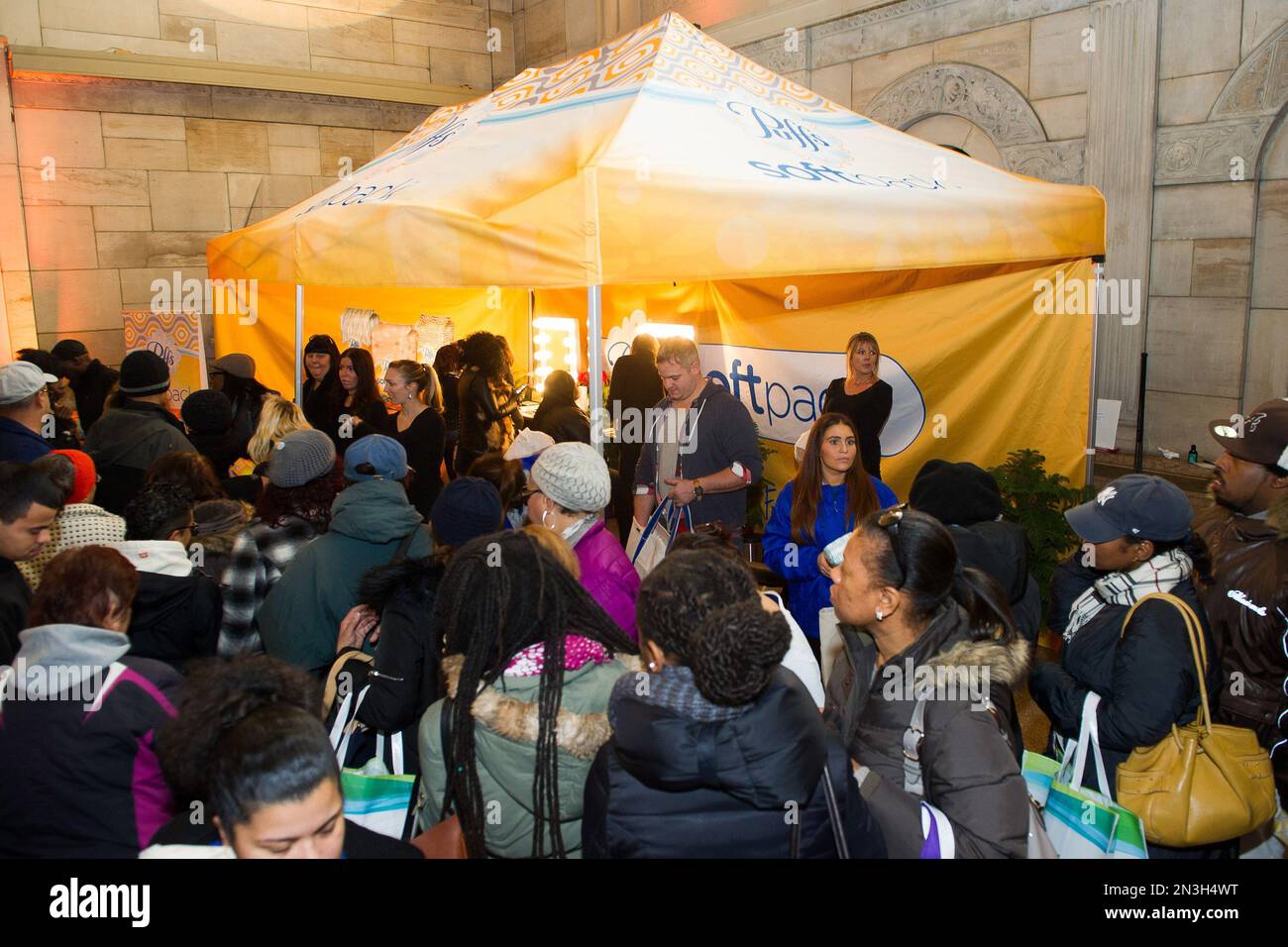 IMAGE DISTRIBUTED FOR PUFFS - Consumers stop by the Puffs SoftPack ...