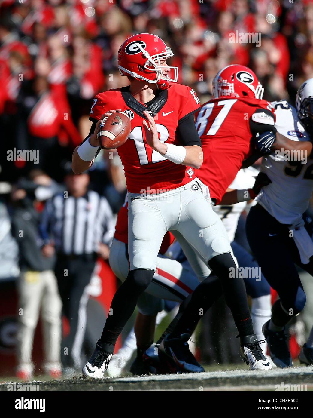 Georgia quarterback Brice Ramsey (12) throws against the Charleston ...