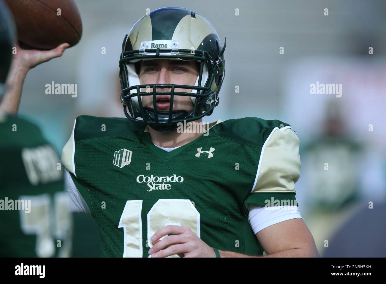 Colorado State quarterback Garrett Grayson warms up before the first ...