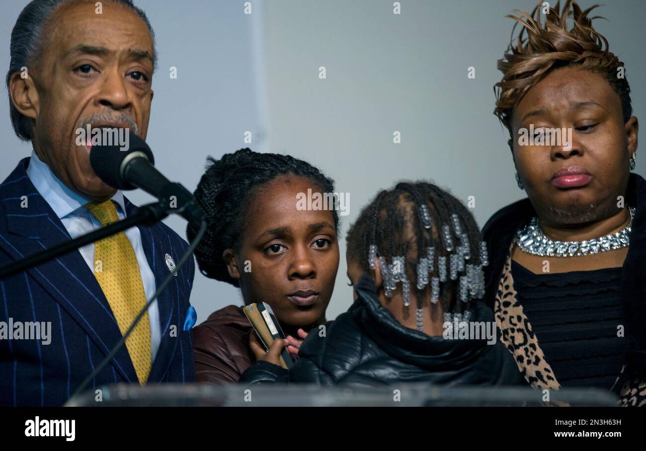 Kimberly Michelle Ballinger, domestic partner of Akai Gurley, center ...