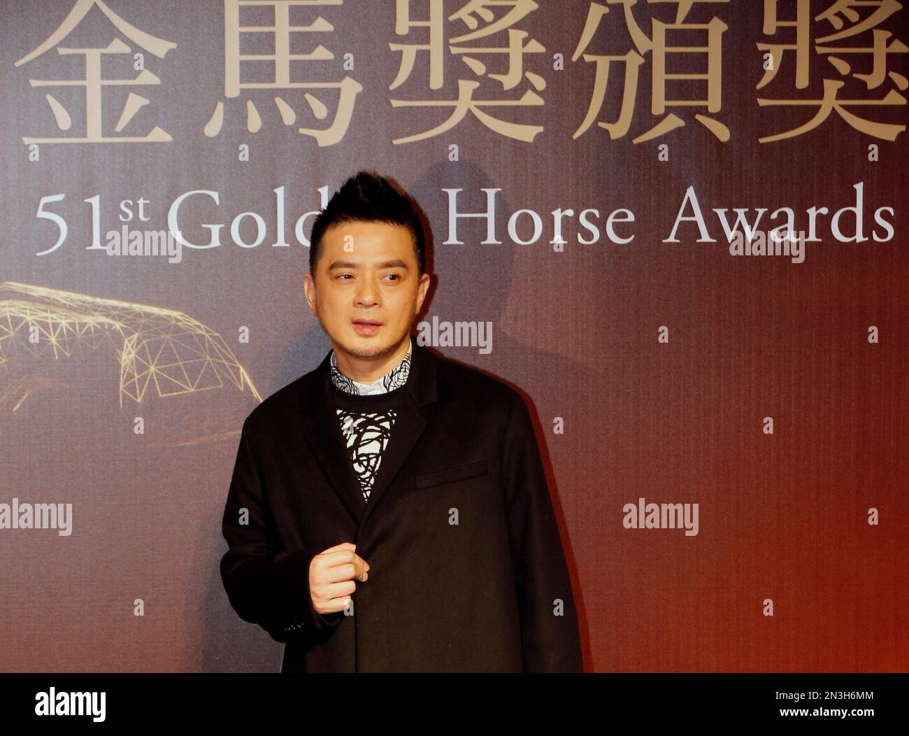 Hong Kong singer Anthony Wong poses on the red carpet at the 51st ...
