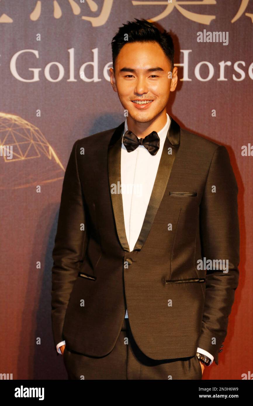 Taiwanese actor Ethan Juan poses on the red carpet at the 51st Golden ...