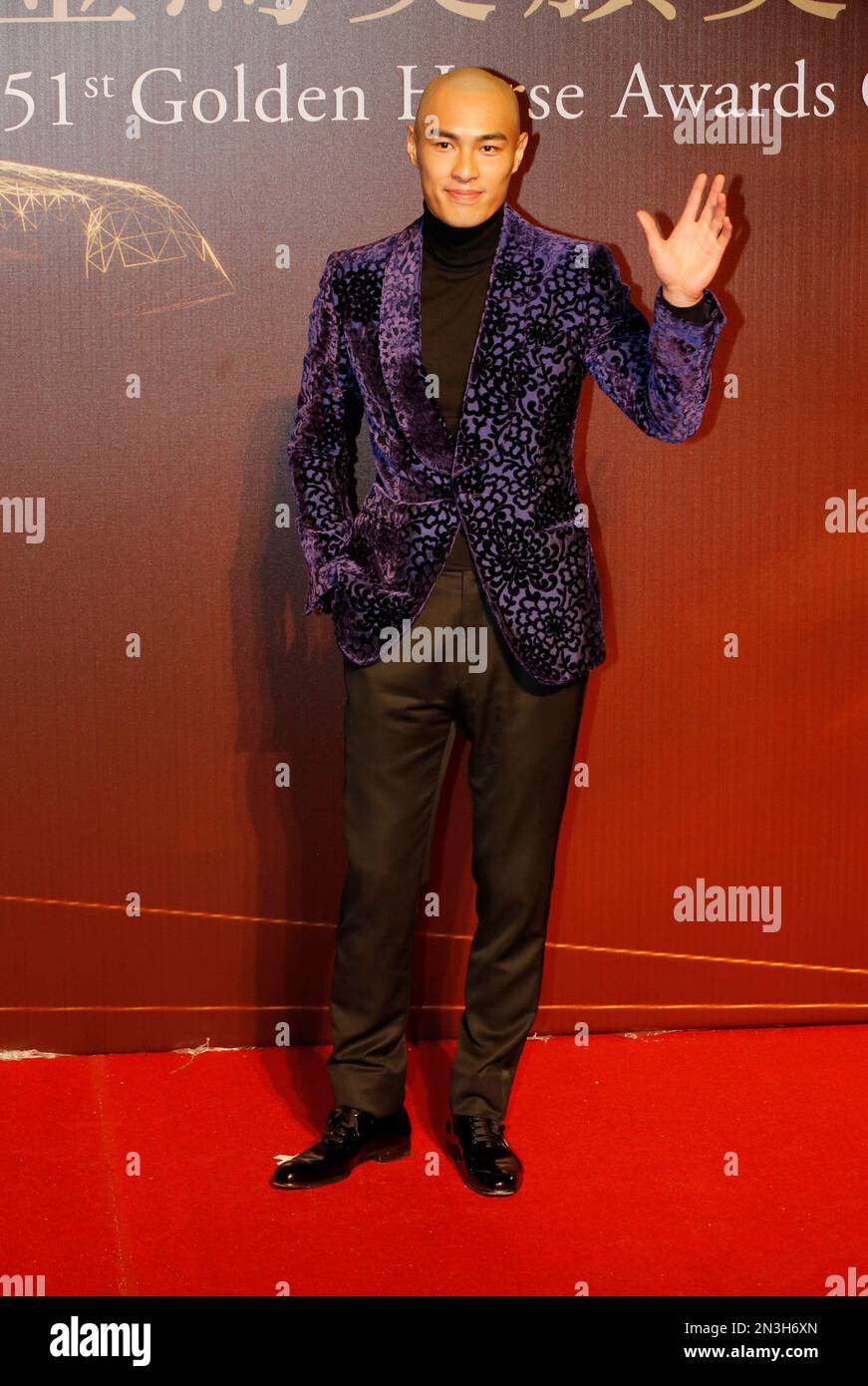 Taiwanese actor Tony Yang poses on the red carpet at the 51st Golden ...
