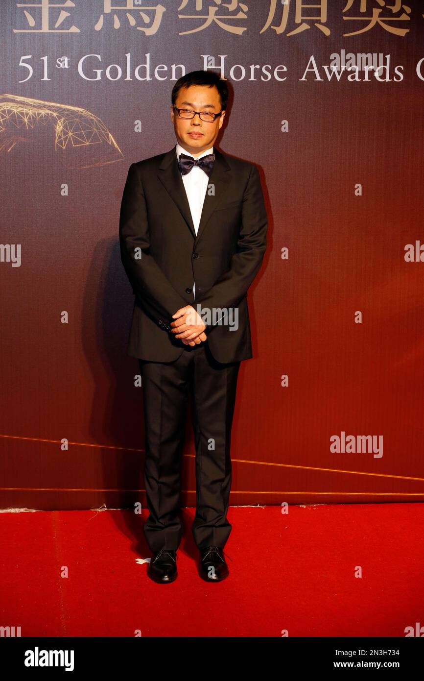 Taiwanese director Chien Hsiang arrives at the 51st Golden Horse Awards ...