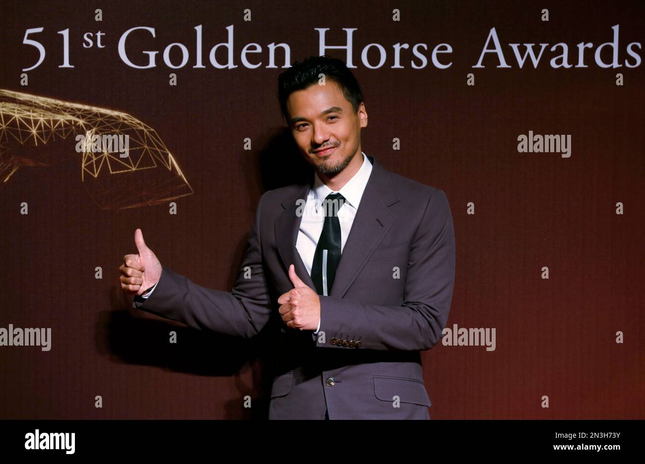 Hong Kong actor Stephen Fung poses on the red carpet at the 51st Golden ...