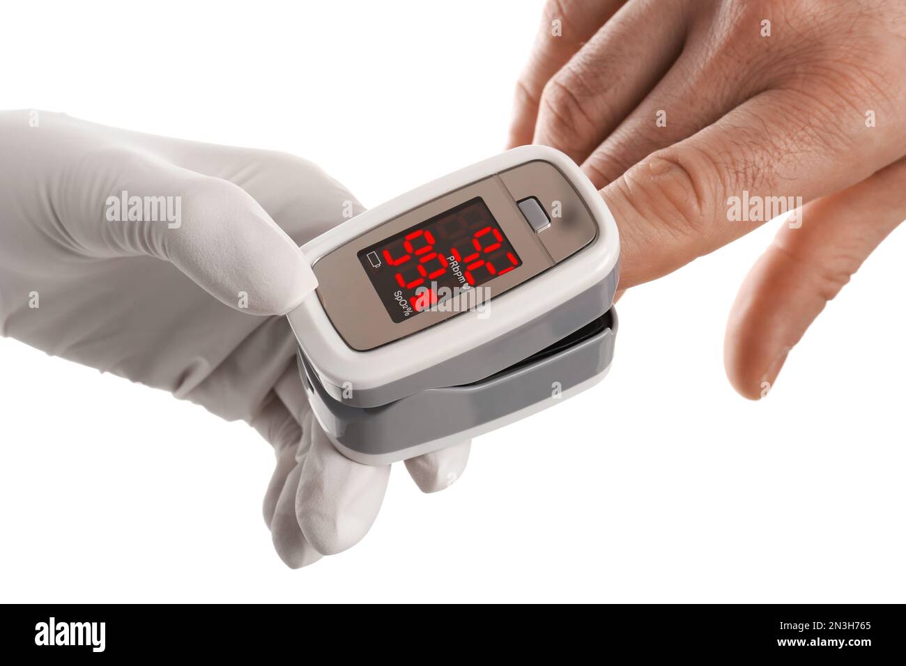 Doctor checking patient's oxygen level with pulse oximeter on white ...
