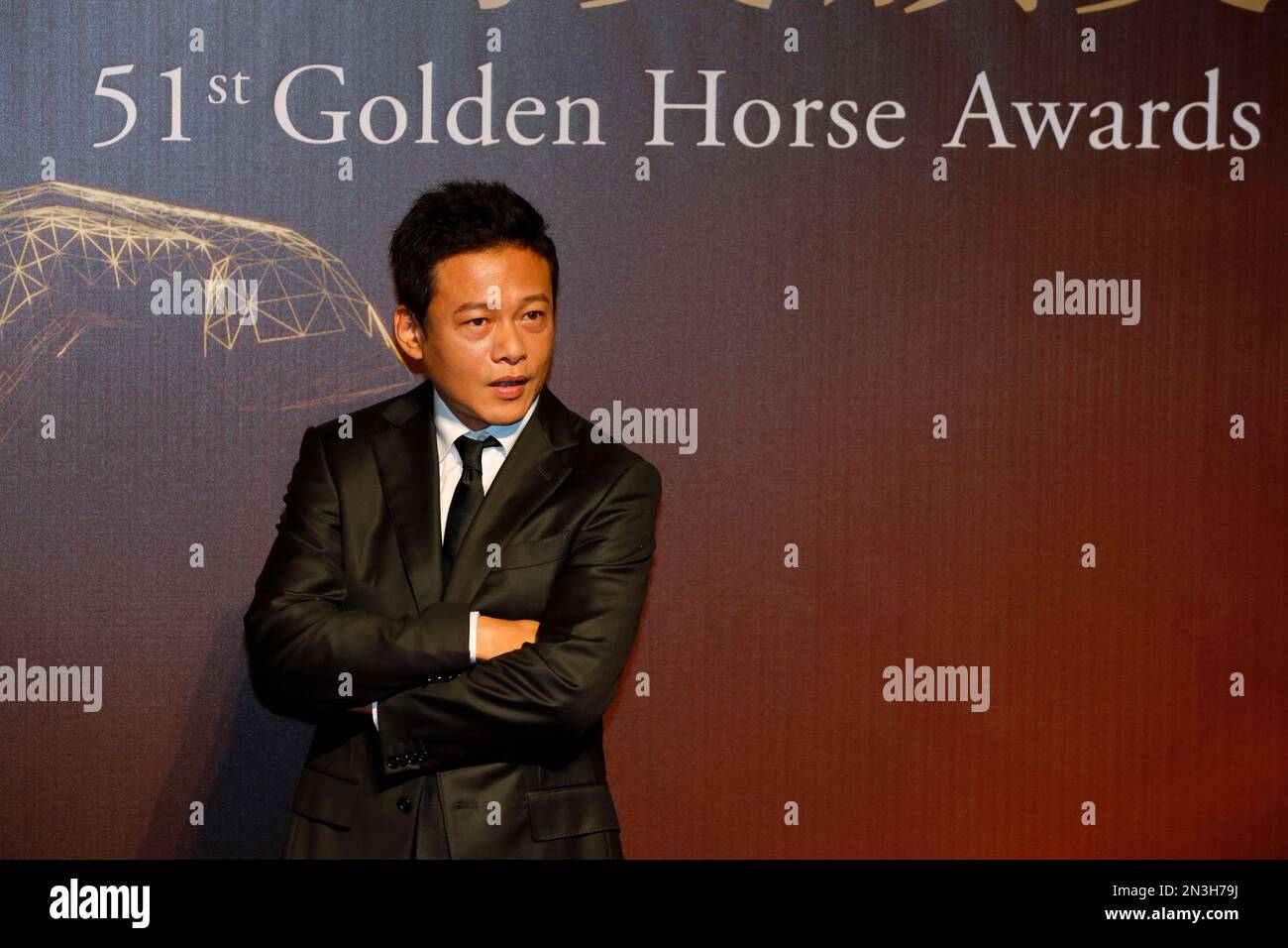 Taiwanese actor and director Lee Kang-sheng poses on the red carpet at ...