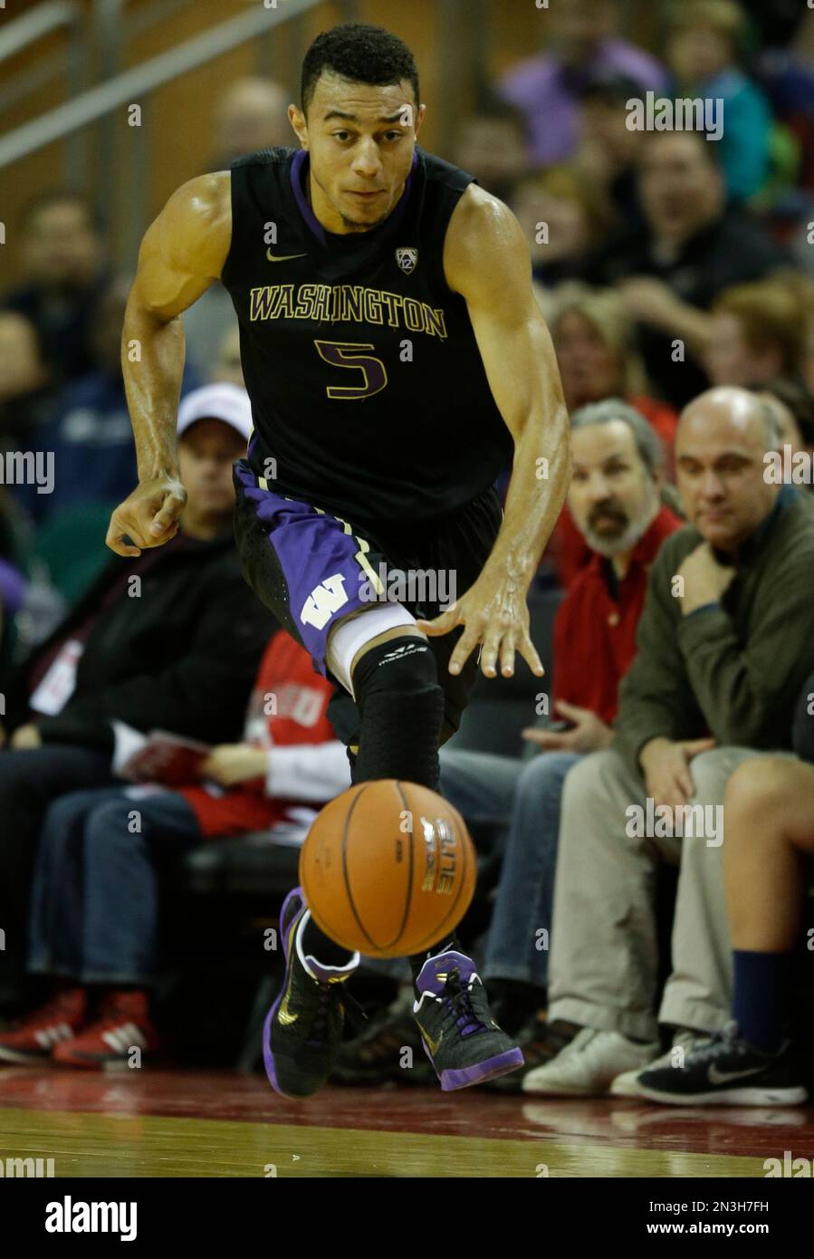 Washington's Nigel Williams-Goss drives downcourt against Seattle in ...