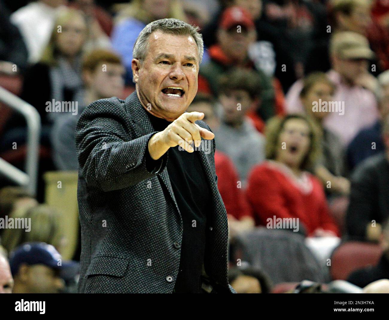 Marshall coach Dan D'Antoni gestures as he shouts instruction to his ...