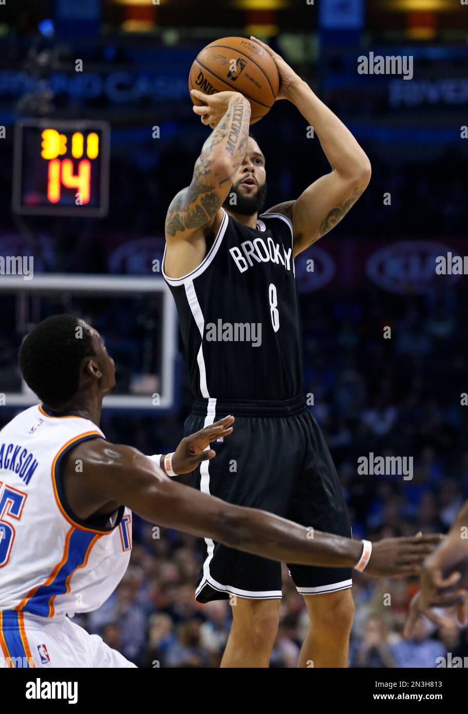 Brooklyn Nets' Deron Williams (8) shoots in front of Oklahoma City ...