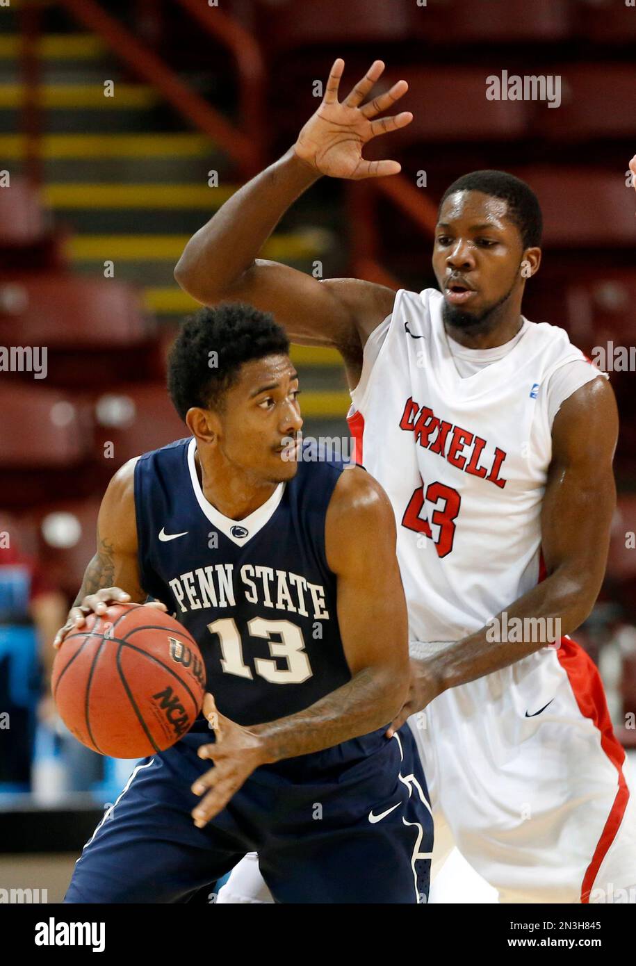 Penn State's Geno Thorpe, left, controls the ball against Cornell's ...