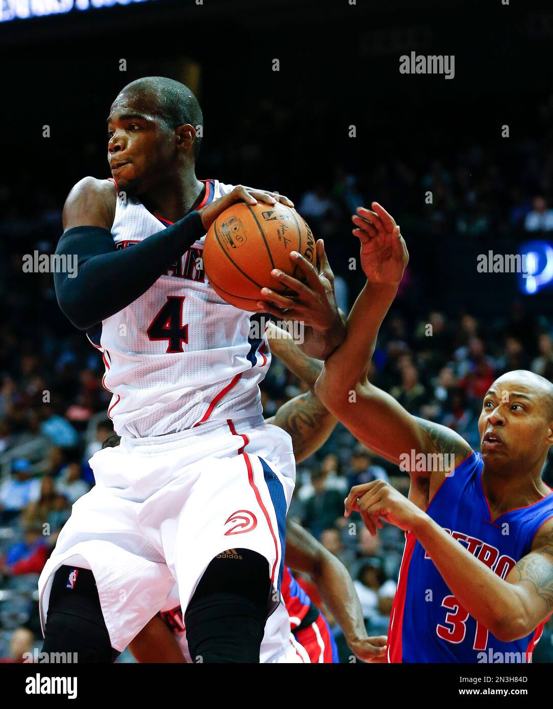 Atlanta Hawks forward Paul Millsap (4) pulls down a rebound against ...