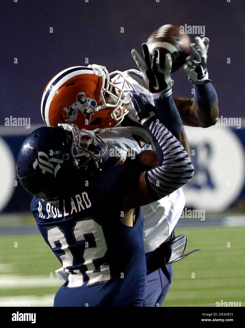Rice cornerback Ryan Pollard (22) breaks up a pass intended for UTEP ...
