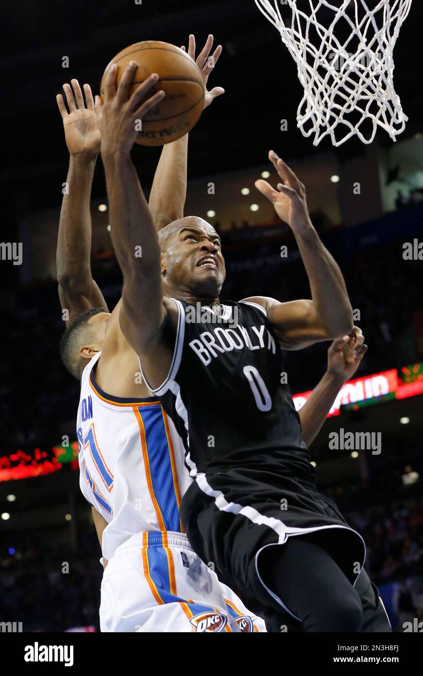 Brooklyn Nets' Jarrett Jack (0) shoots in front of Oklahoma City ...