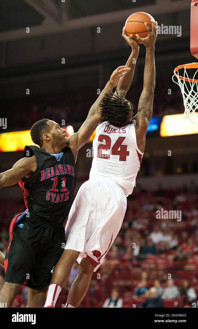 Arkansas' Michael Qualls (24) reaches for the basket as Delaware State ... Arkansas' Michael Qualls (24) reaches for the basket as Delaware State ...