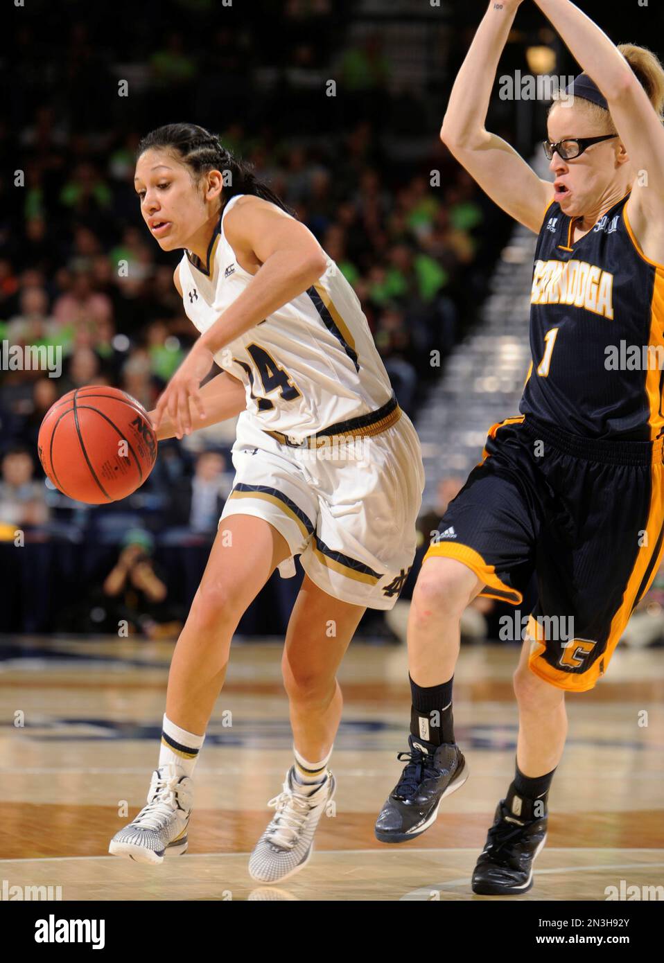 Notre Dame guard Mychal Johnson, left, drives the lane past Chattanooga ...