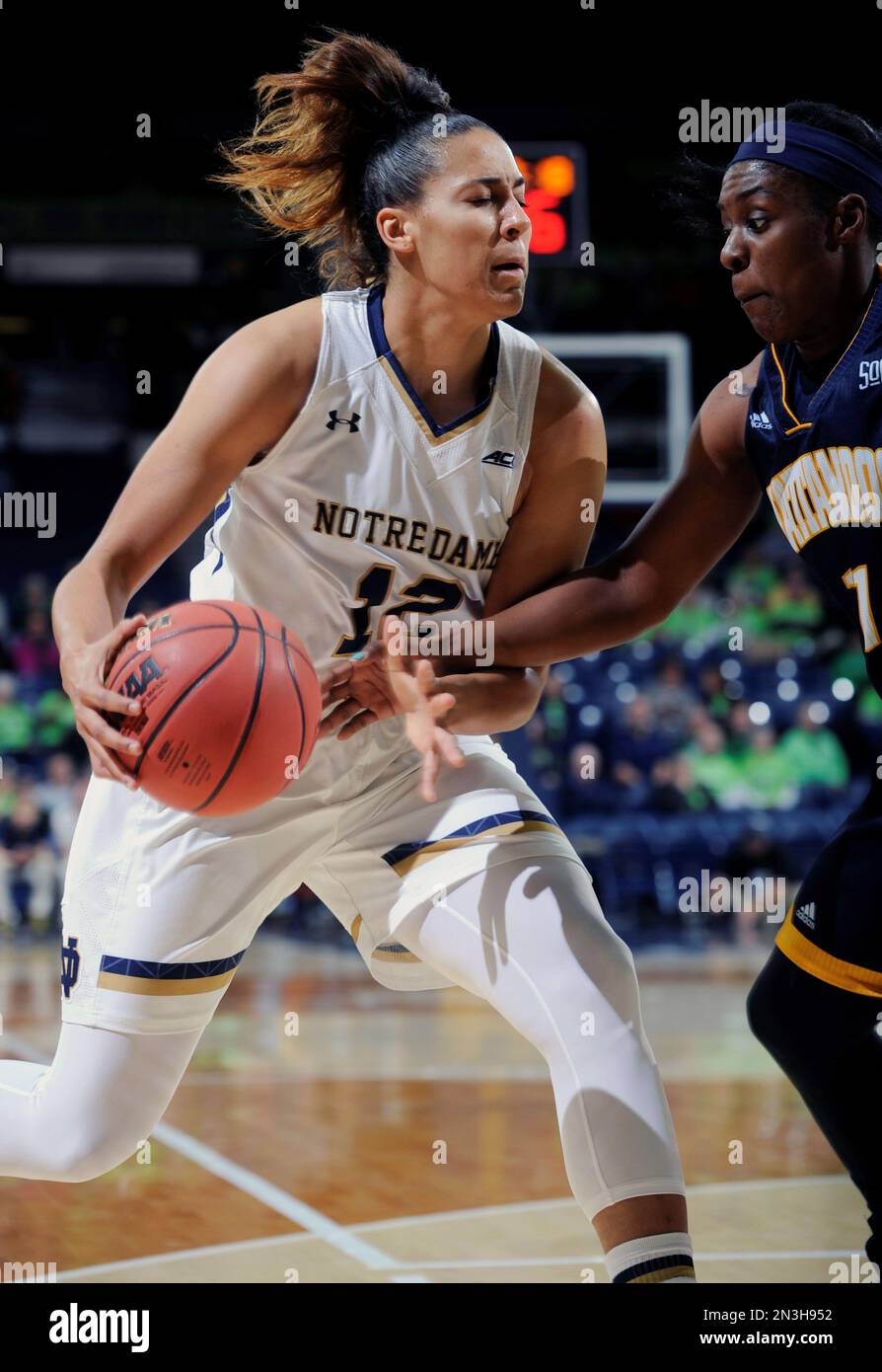 Notre Dame forward Taya Reimer, left, drives the lane as Chattanooga ...