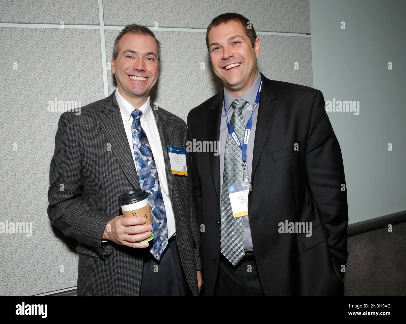General Motor's Bob Babik and Alex Keros attend the Electric Vehicle ...
