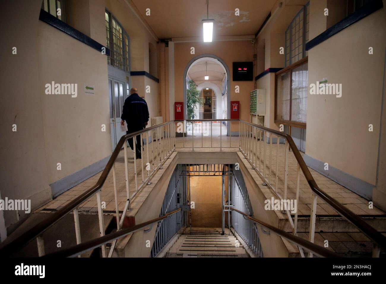 A security guard walks in the prison's entrance hall of Parisâ€™ mythic ...