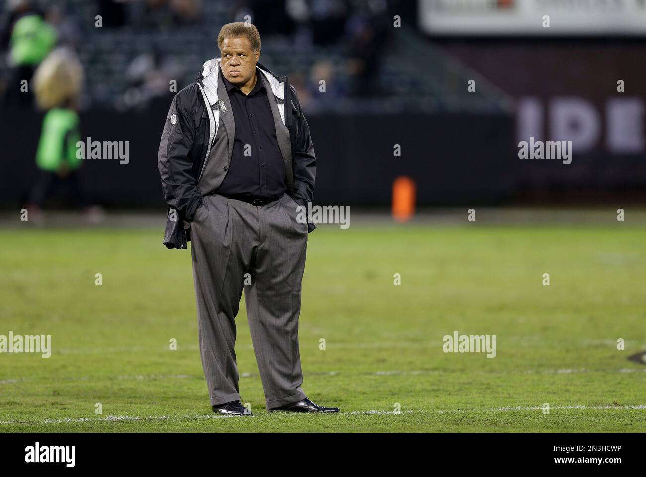 Oakland Raiders general manager Reggie McKenzie stands on the field ...