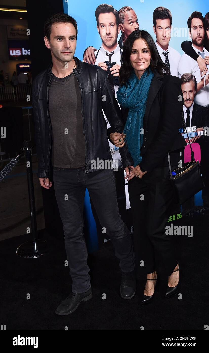 Courteney Cox, right, and Johnny McDaid arrive at the Los Angeles ...