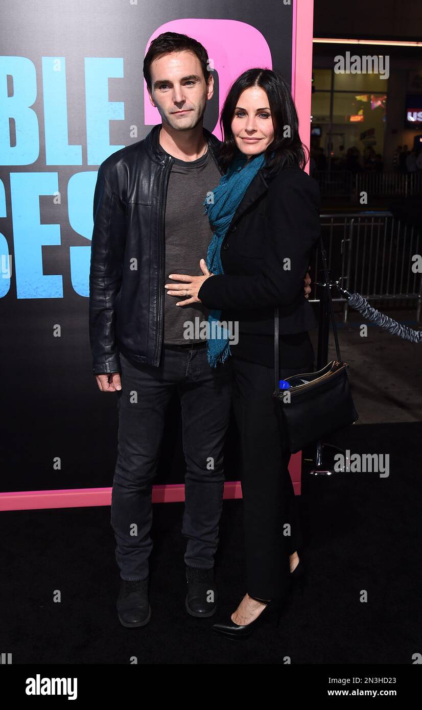 Courteney Cox, right, and Johnny McDaid arrive at the Los Angeles ...