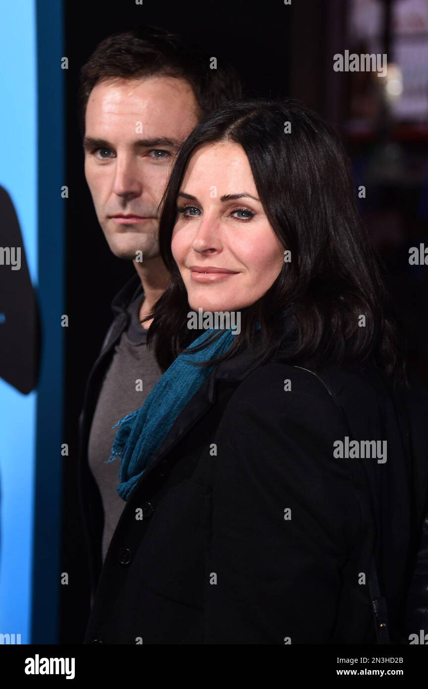 Courteney Cox, right, and Johnny McDaid arrive at the Los Angeles ...