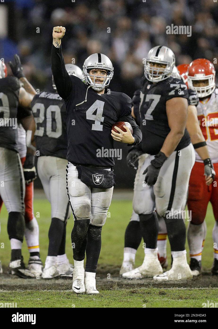 Oakland Raiders quarterback Derek Carr (4) celebrates after the Raiders ...