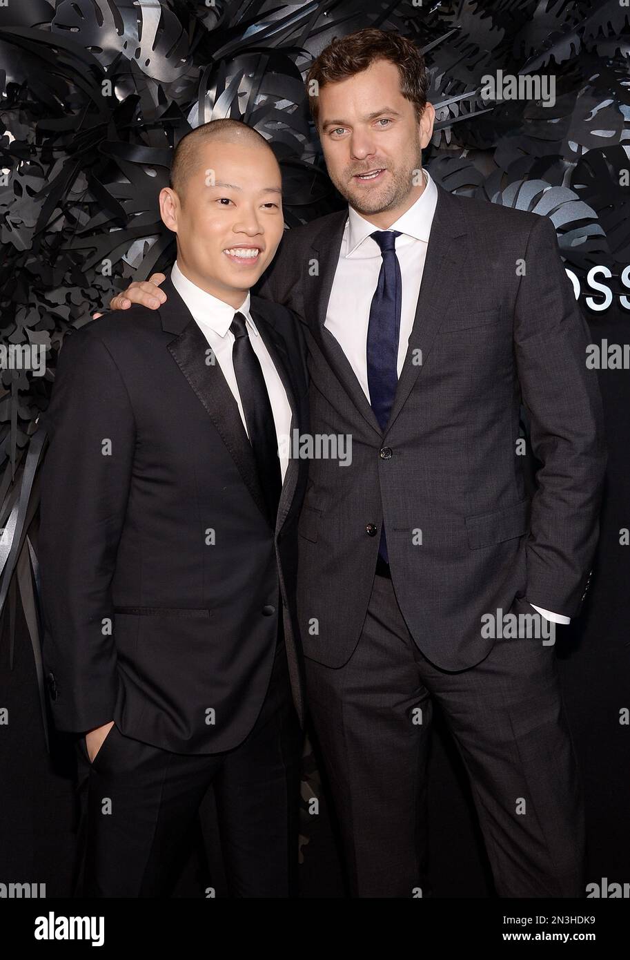 Designer, artistic director of Hugo Boss Jason Wu, left, and actor ...