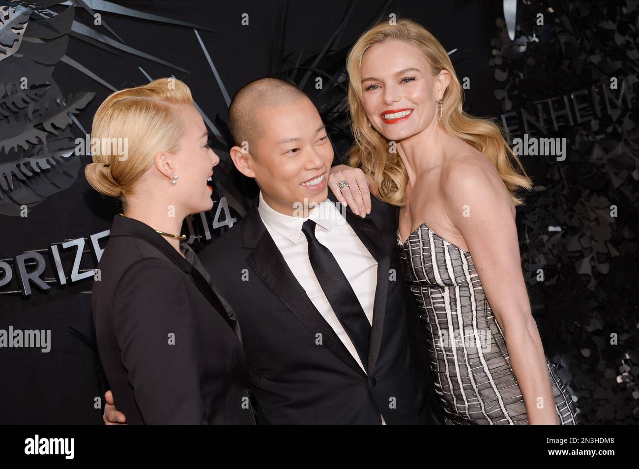 Designer, artistic director of Hugo Boss Jason Wu and actresses Margot ...