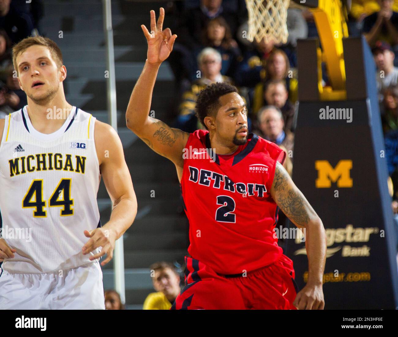 Michigan forward Max Bielfeldt (44) runs ahead of Detroit forward Juwan ... Michigan forward Max Bielfeldt (44) runs ahead of Detroit forward Juwan ...
