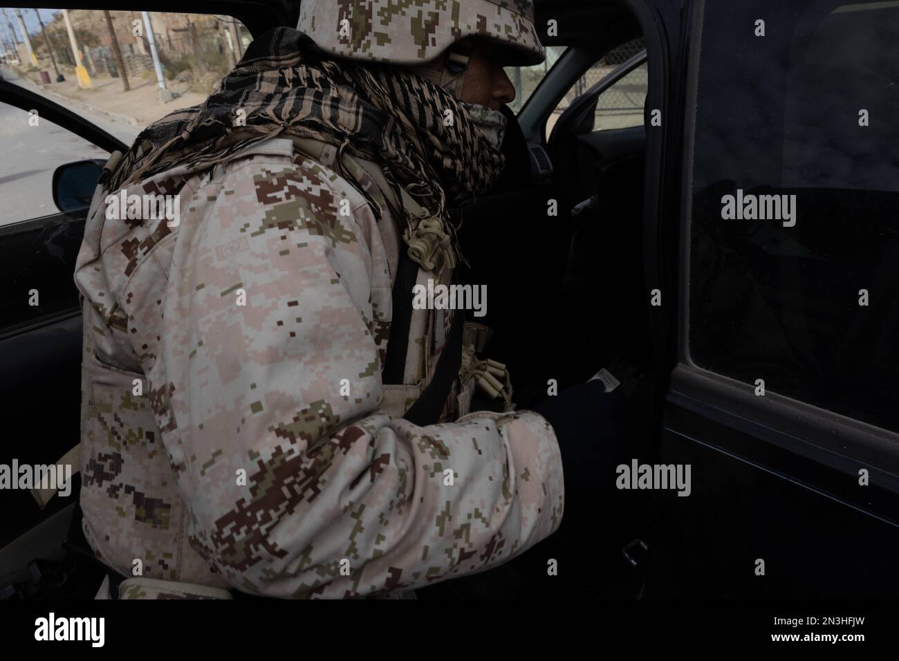 Juarez, Mexico, 11-11-2022: National Guard checks a car at a checkpoint ...